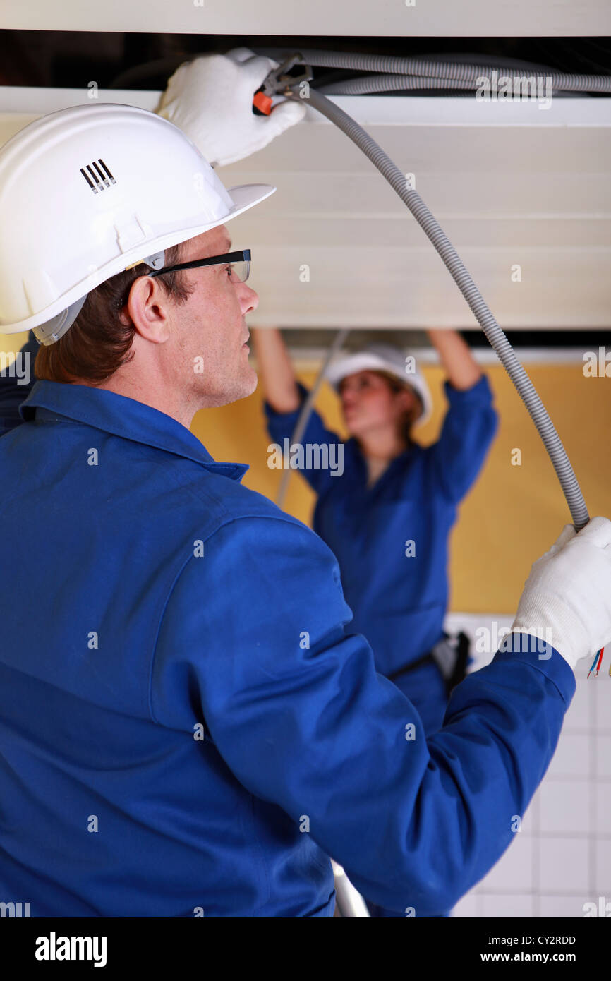 craftsman working on a construction site Stock Photo - Alamy