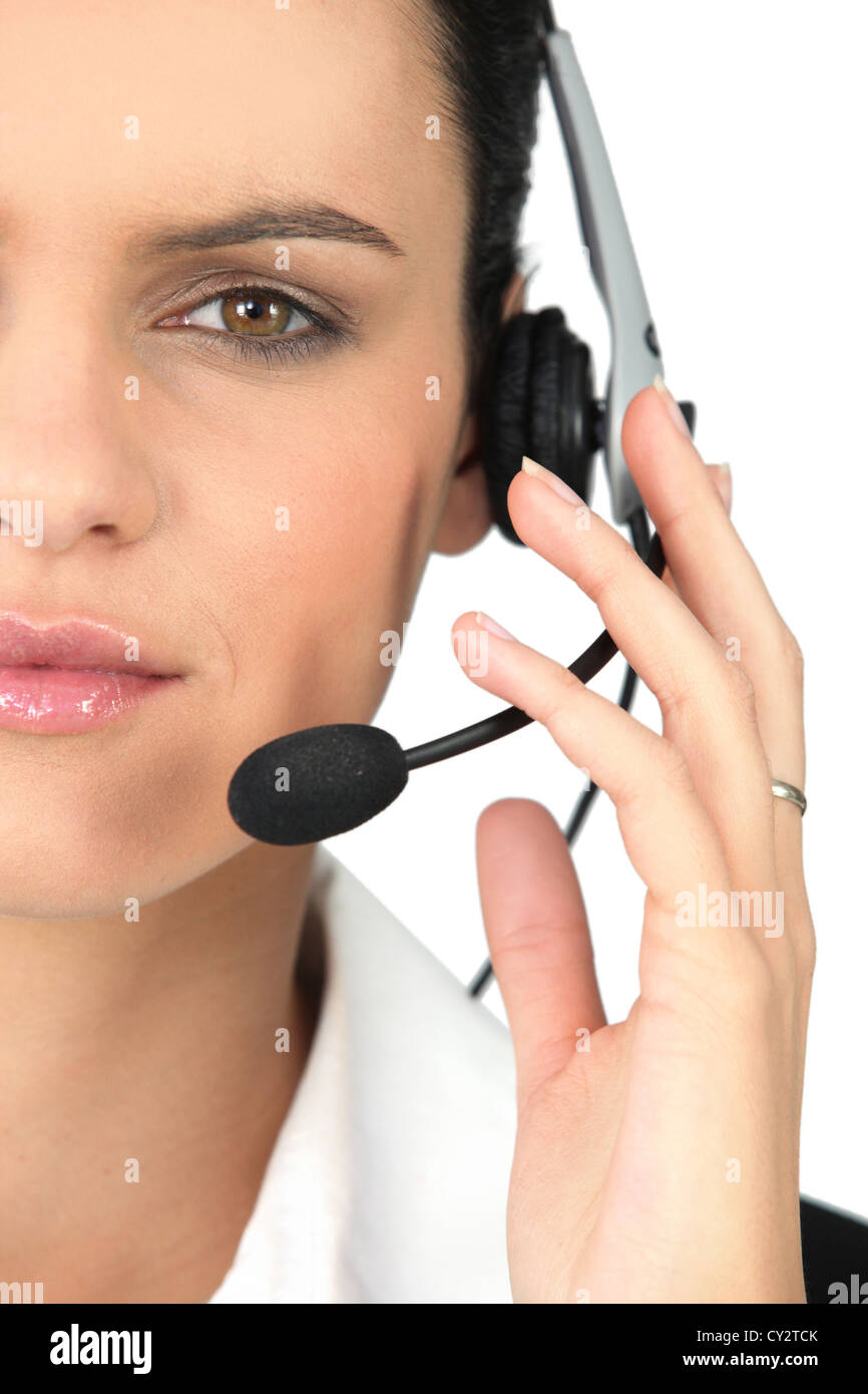 Secretary wearing a headset Stock Photo - Alamy