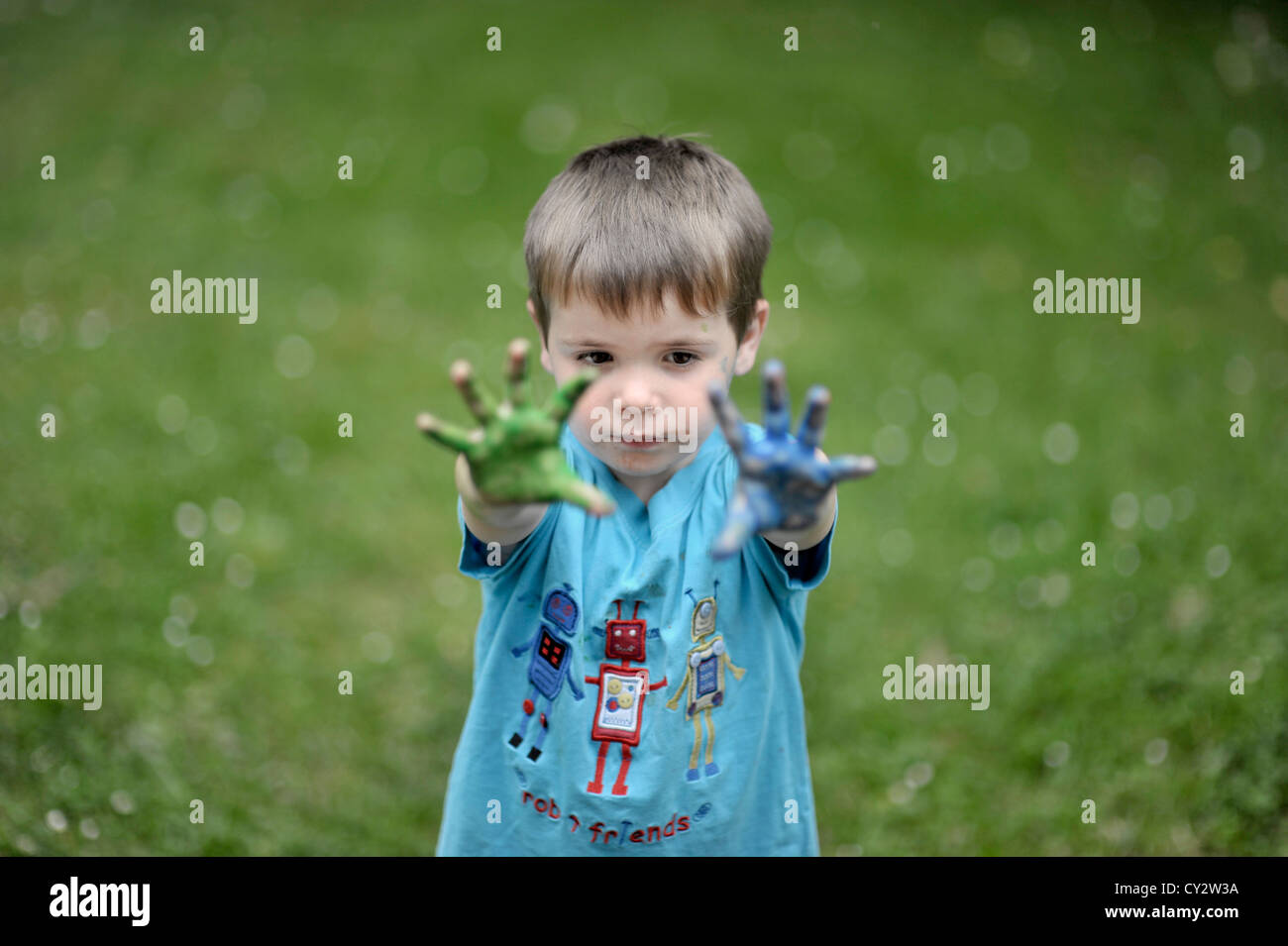 boy painted hands portrait Stock Photo - Alamy