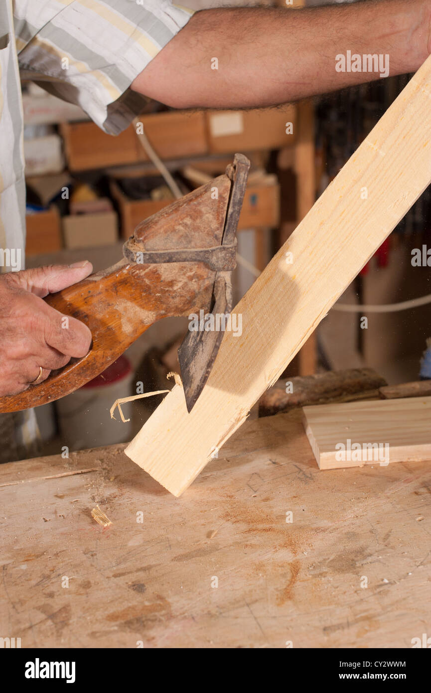 Carpenter hands using a traditional tool Stock Photo - Alamy