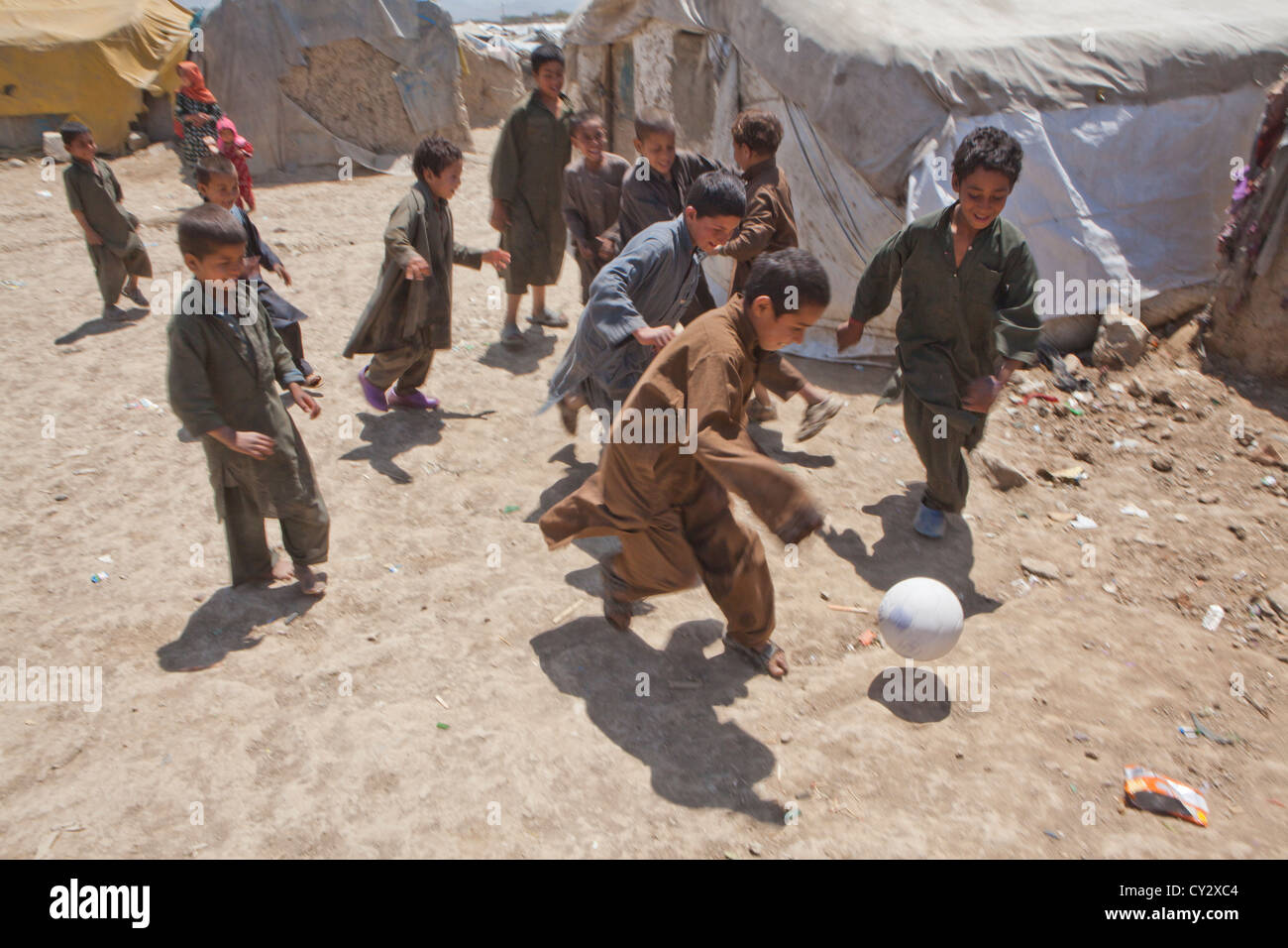 Afghan children playing in a slum in Kabul Stock Photo - Alamy
