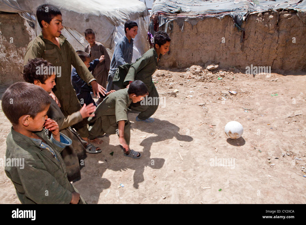 Afghan children playing in a slum in Kabul Stock Photo - Alamy