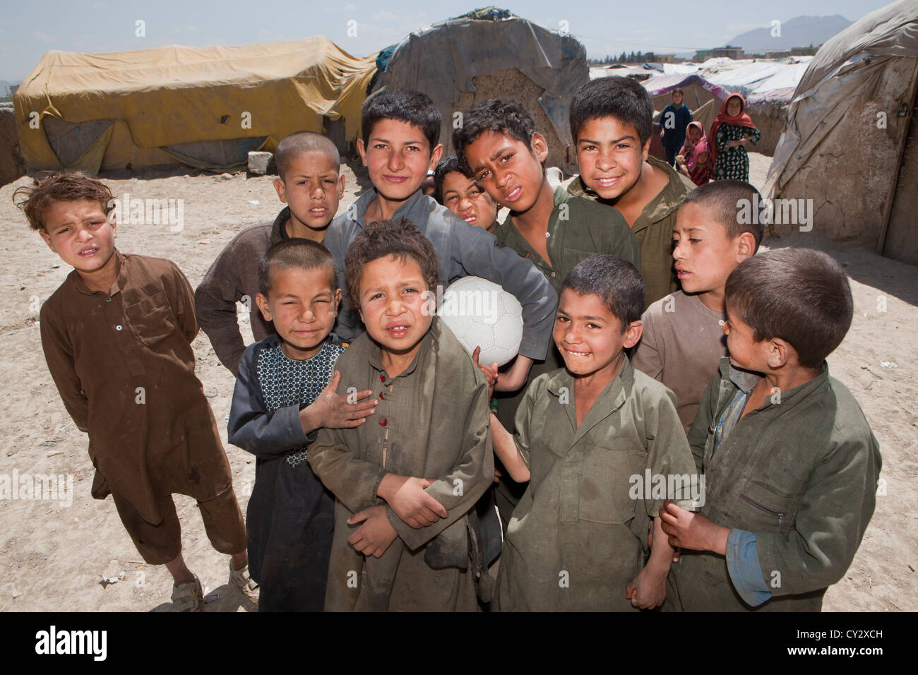 Afghan children playing in a slum in Kabul Stock Photo - Alamy