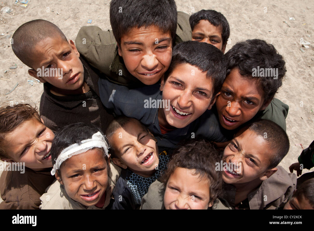 Afghan children playing in a slum in Kabul Stock Photo - Alamy