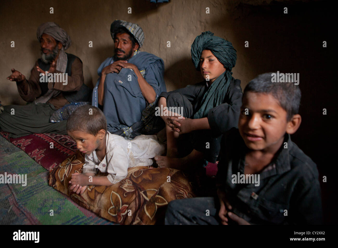 Afghan family living as displaced people in a slum in kabul Stock Photo ...
