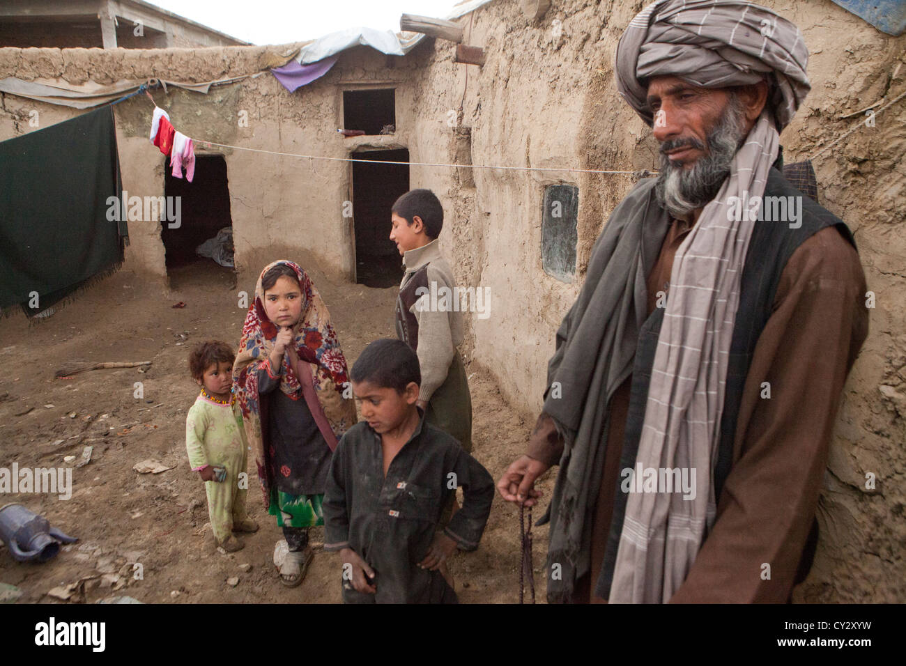 Afghan family living as displaced people in a slum in kabul Stock Photo ...