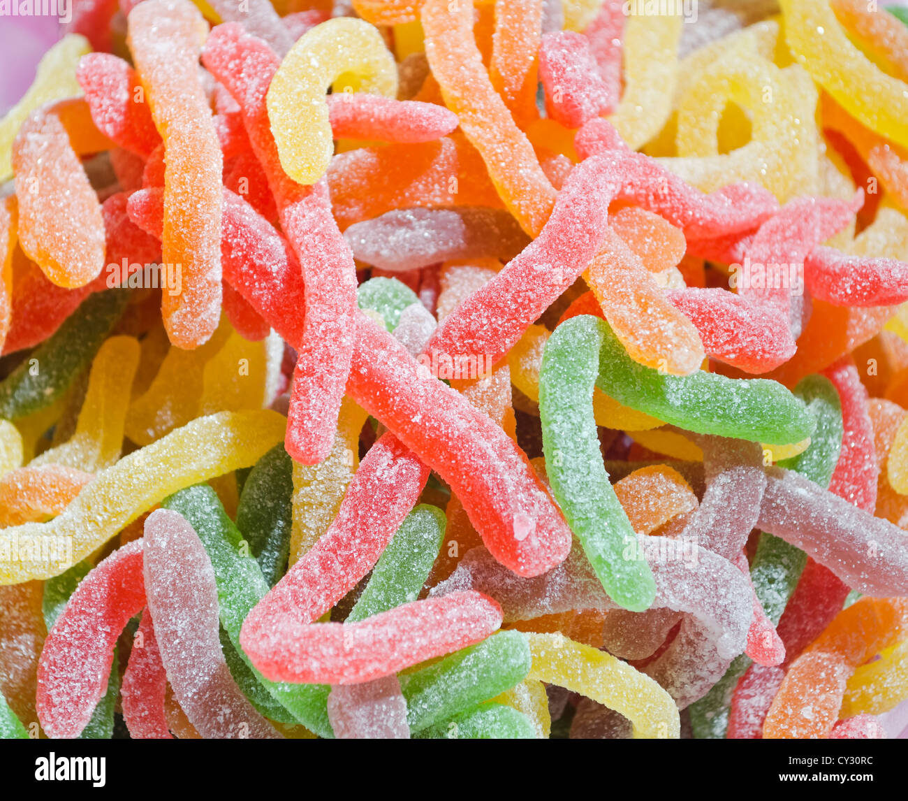 Multi-colored gummy candies served in a children's party Stock Photo ...