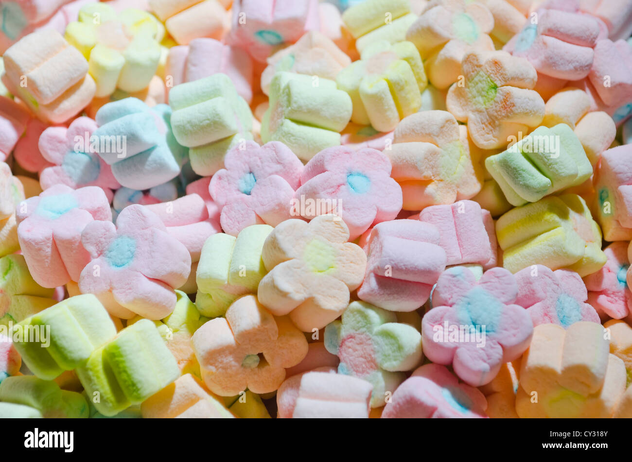 Multicolor flower-shaped marshmallows served at a children's party ...
