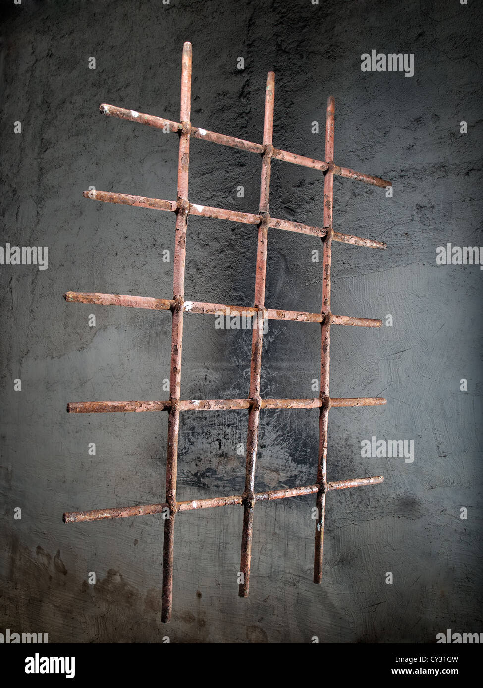 Rusty iron grille on a grunge background Stock Photo - Alamy