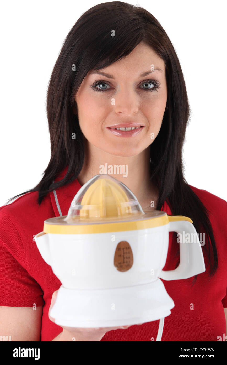 woman holding squeezer Stock Photo - Alamy