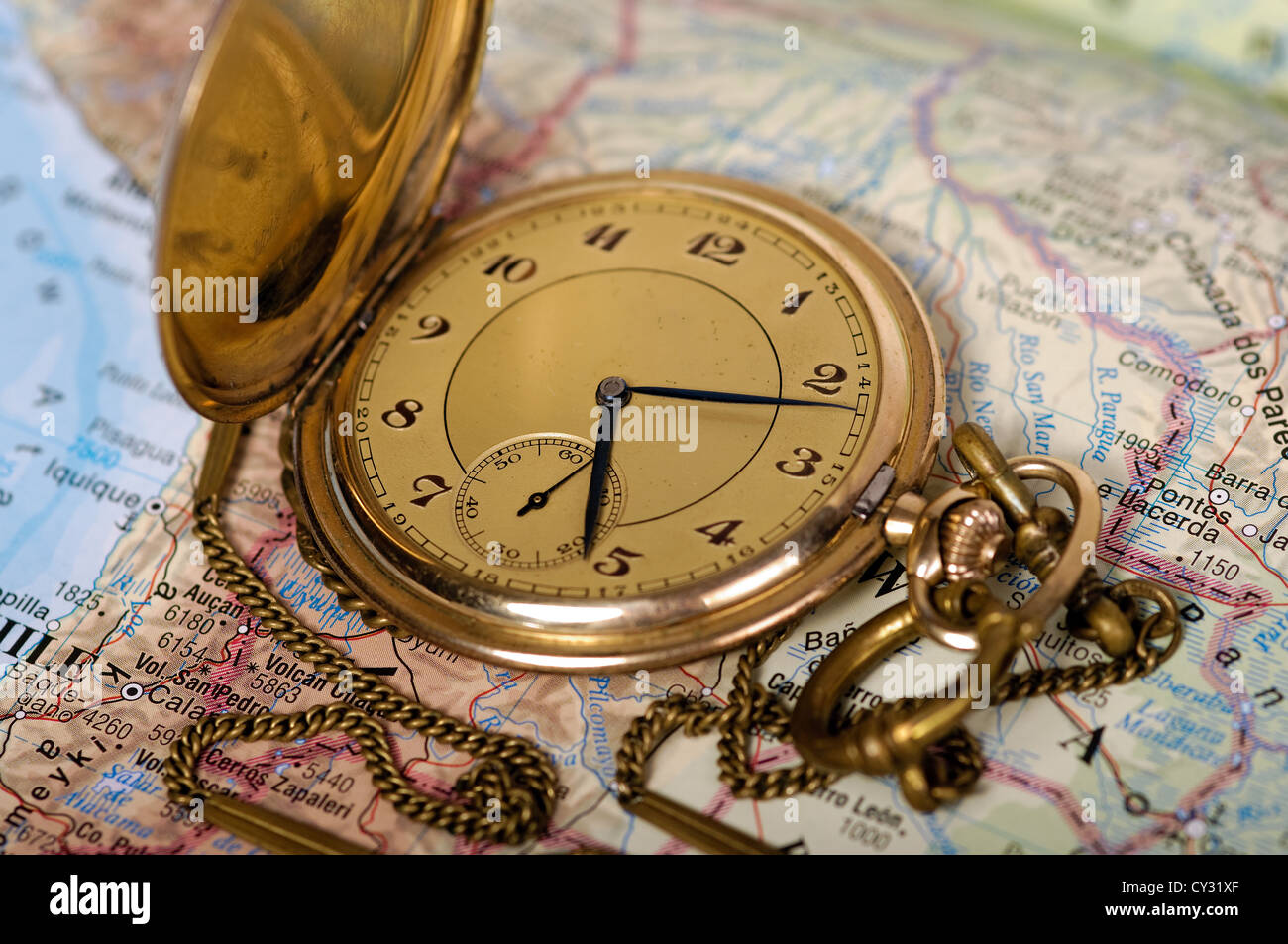 Photo of old watch on map Stock Photo - Alamy