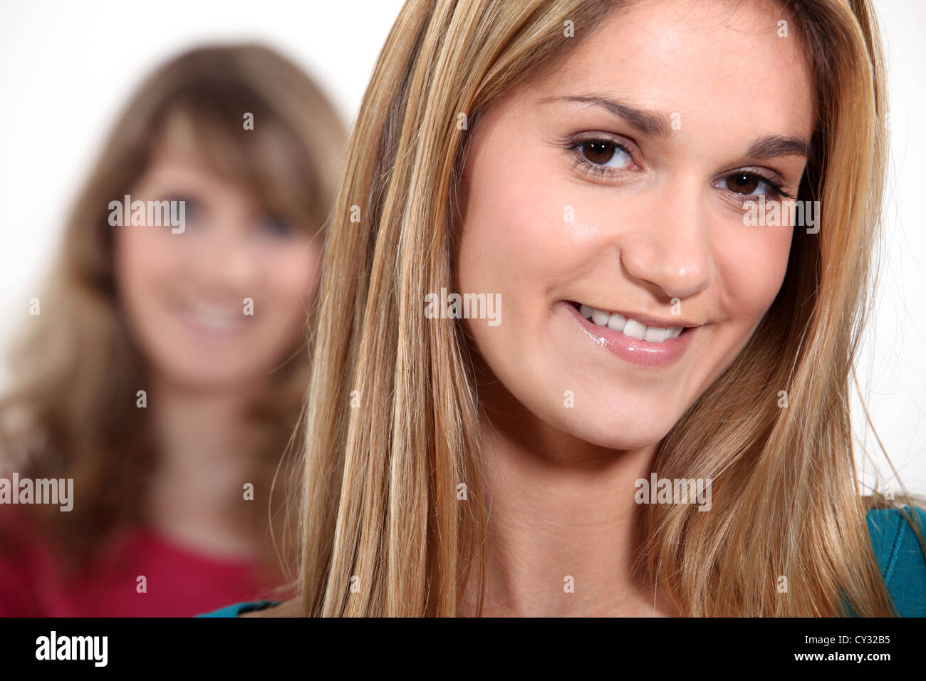 Tow female friends in studio Stock Photo - Alamy