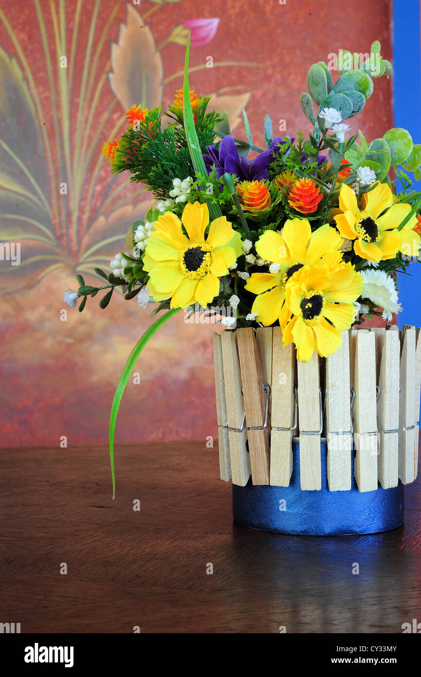 Artificial flower on paper clip vase Stock Photo - Alamy