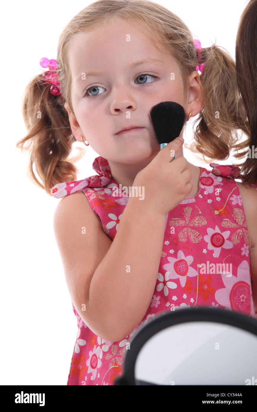 Child putting on makeup Stock Photo - Alamy