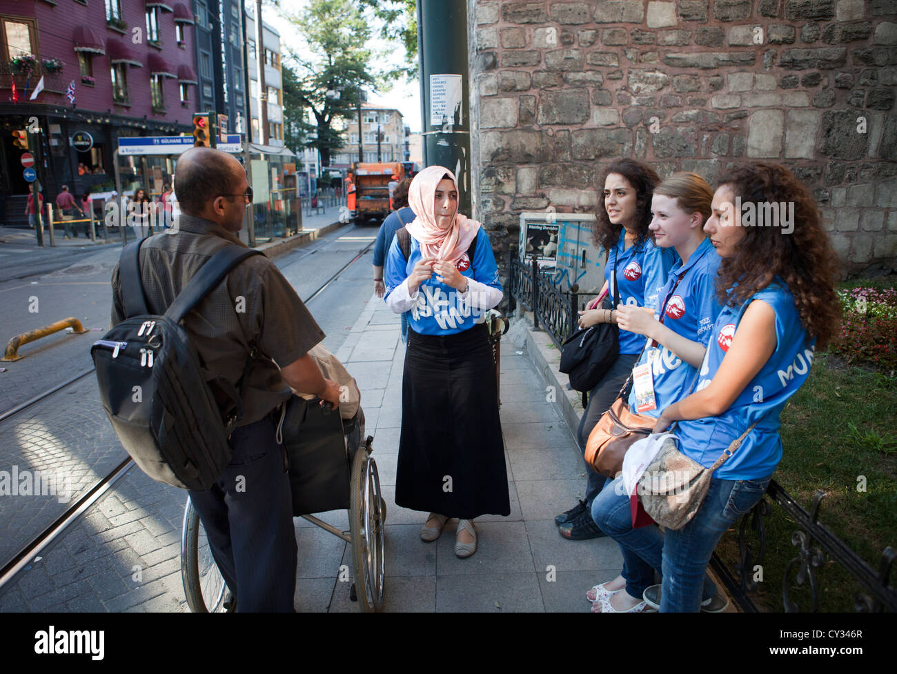 girls from the tourist information desk helping tourists Stock Photo ...