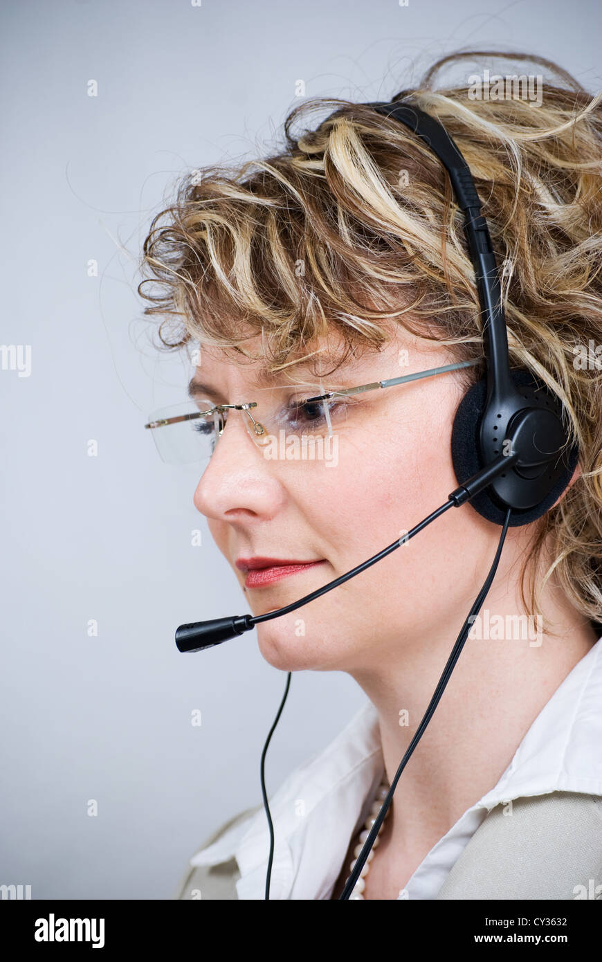 CUSTOMER SERVICE AGENT LOOKING Stock Photo - Alamy