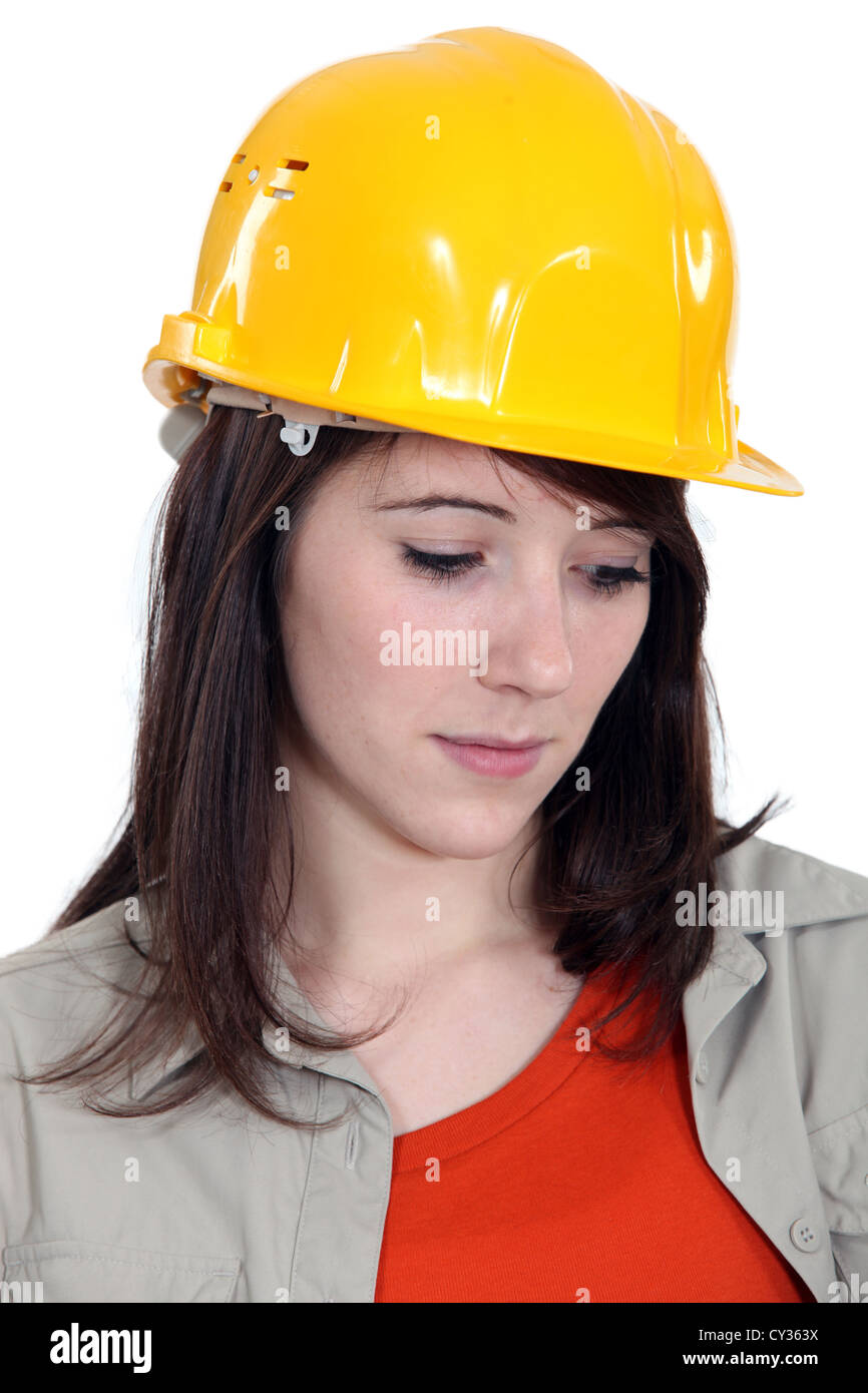 A sad female construction worker Stock Photo - Alamy