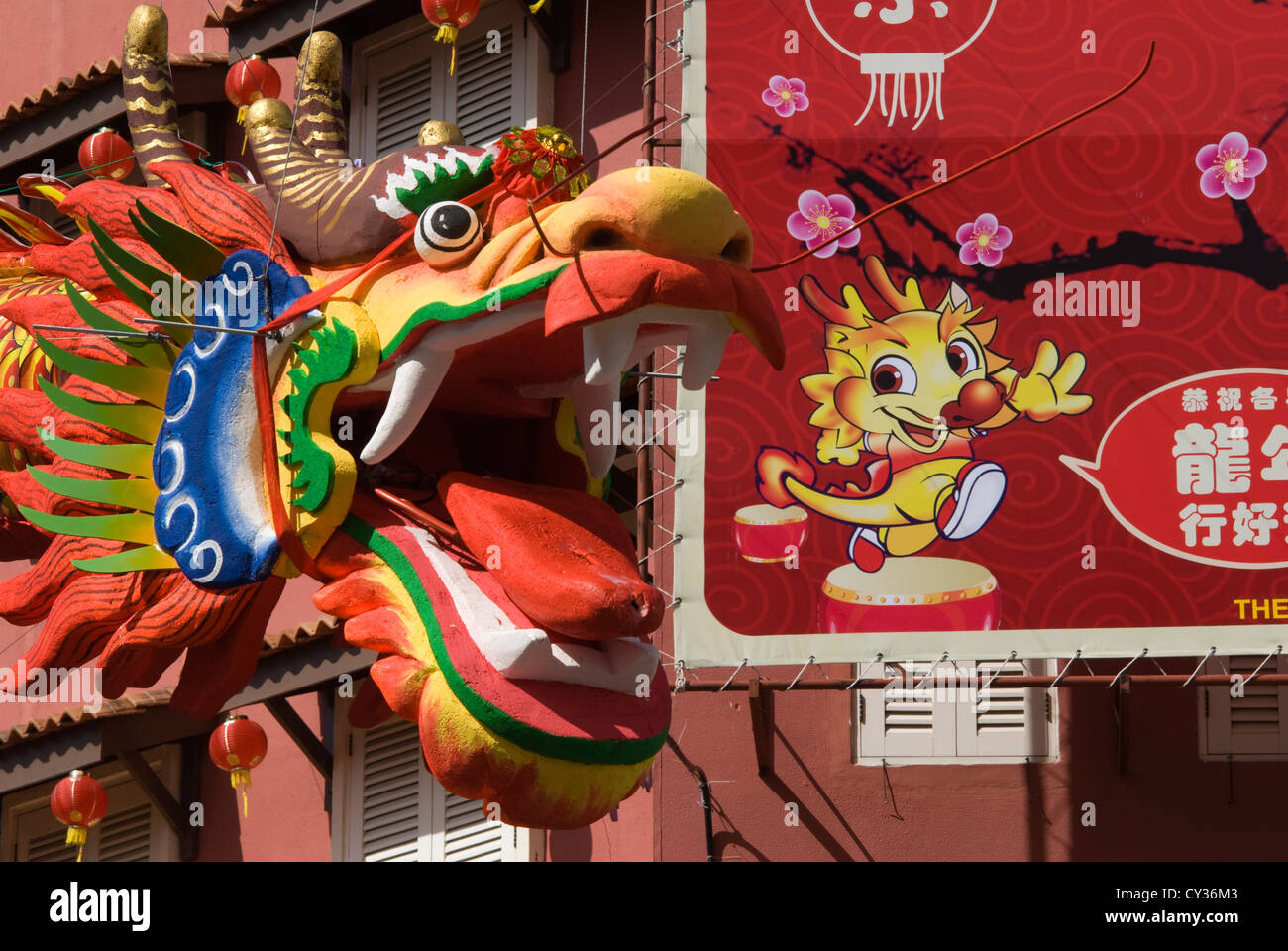 A freshly painted Chinese dragon adorns the main street of Chinatown ...