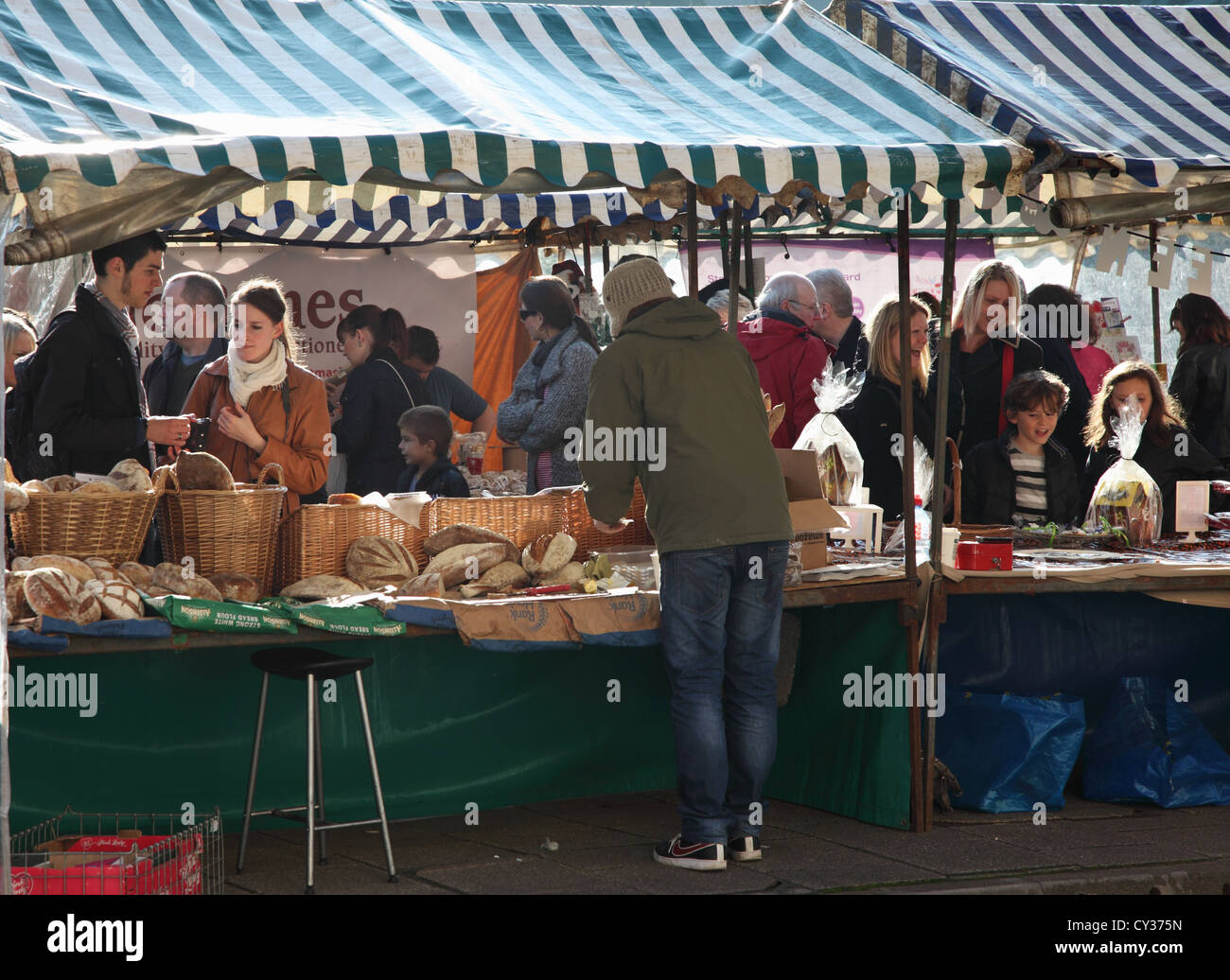 People at a stall within Newcastle Quayside Sunday market, north east ...