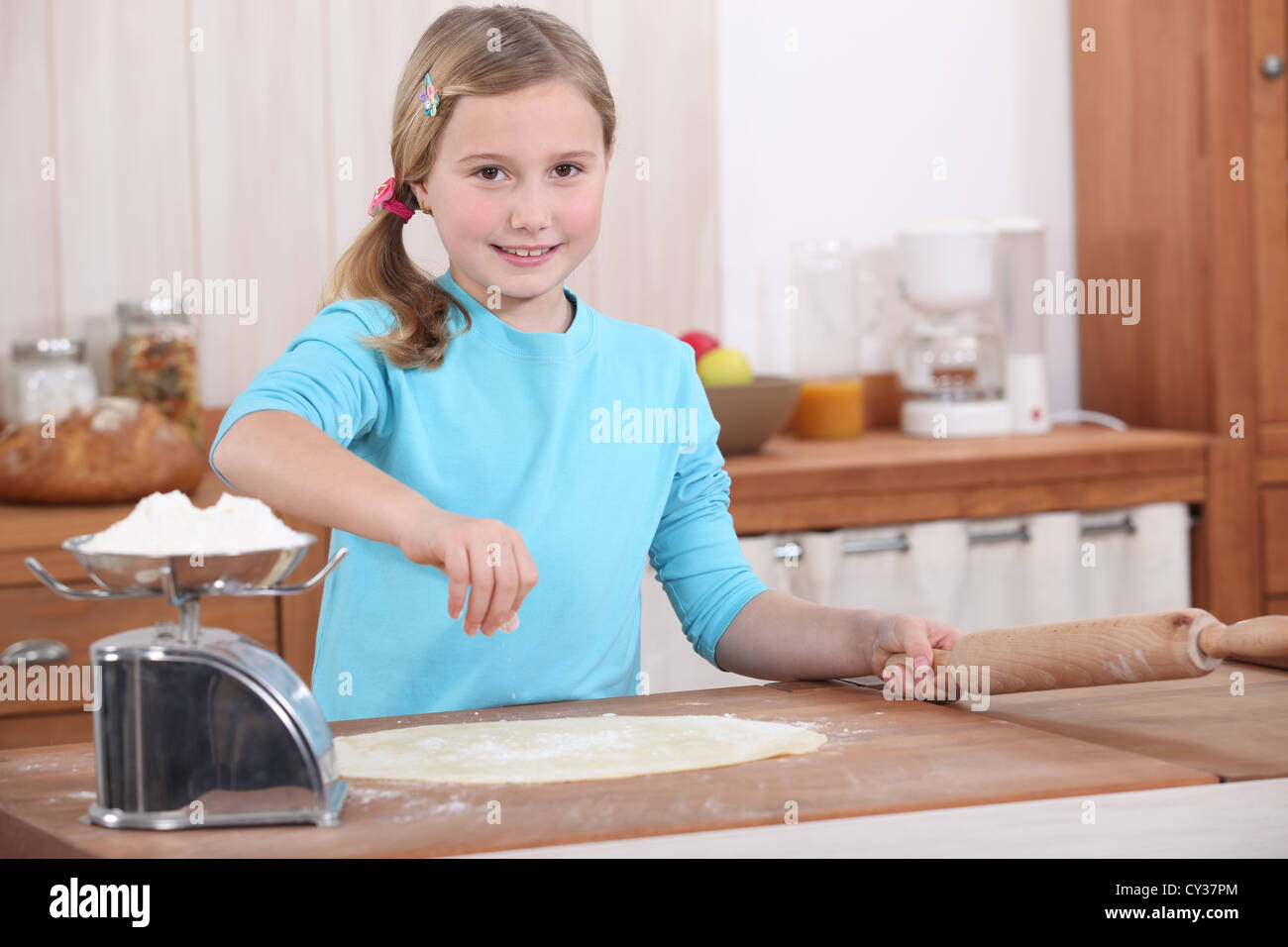 Girl making pastry Stock Photo - Alamy