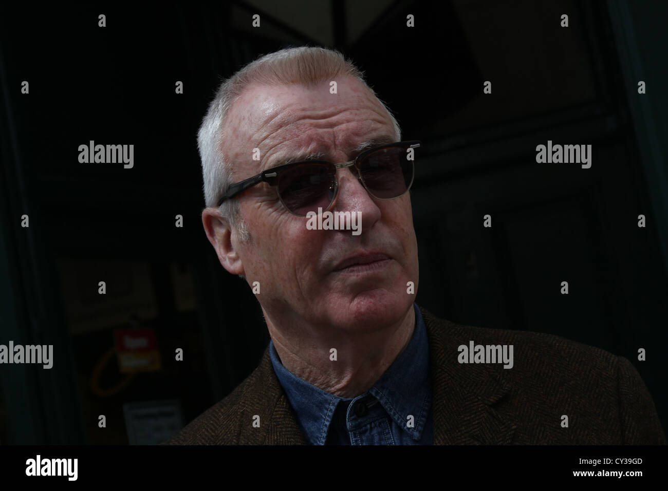 Lloyd Johnson in the doorway at 406 King's Road, London Stock Photo - Alamy