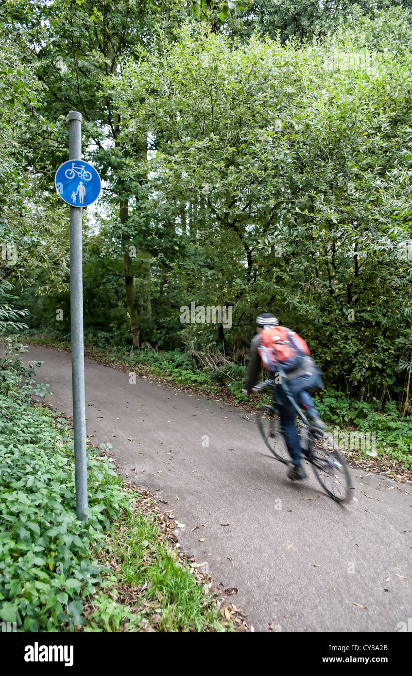 A cyclist on a cycle path Stock Photo - Alamy