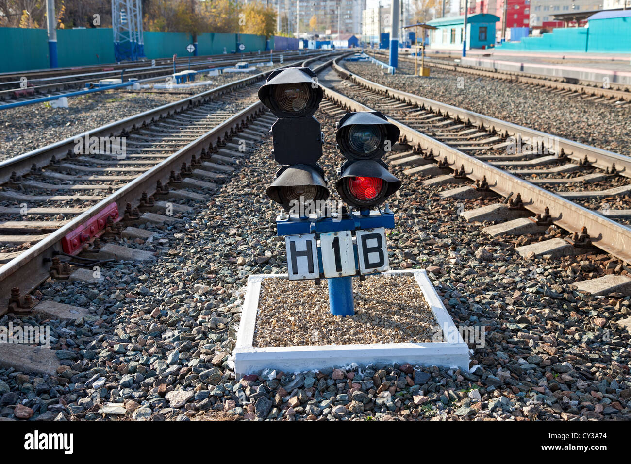 Traffic light shows red signal on railway Stock Photo - Alamy