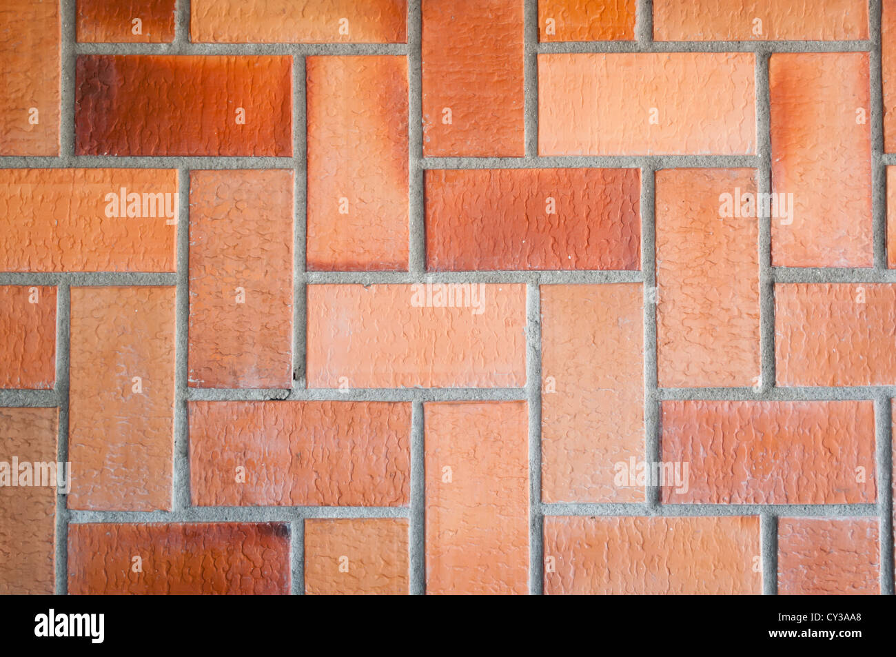 brick wall of red clay forming abstract design Stock Photo - Alamy
