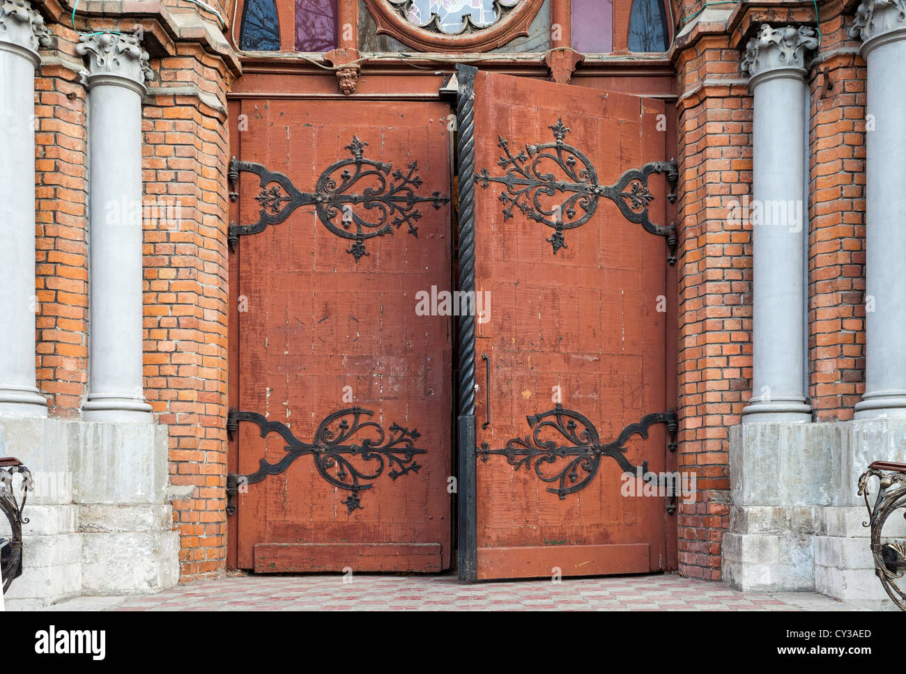 Old massive wooden gate in catholic church Stock Photo - Alamy