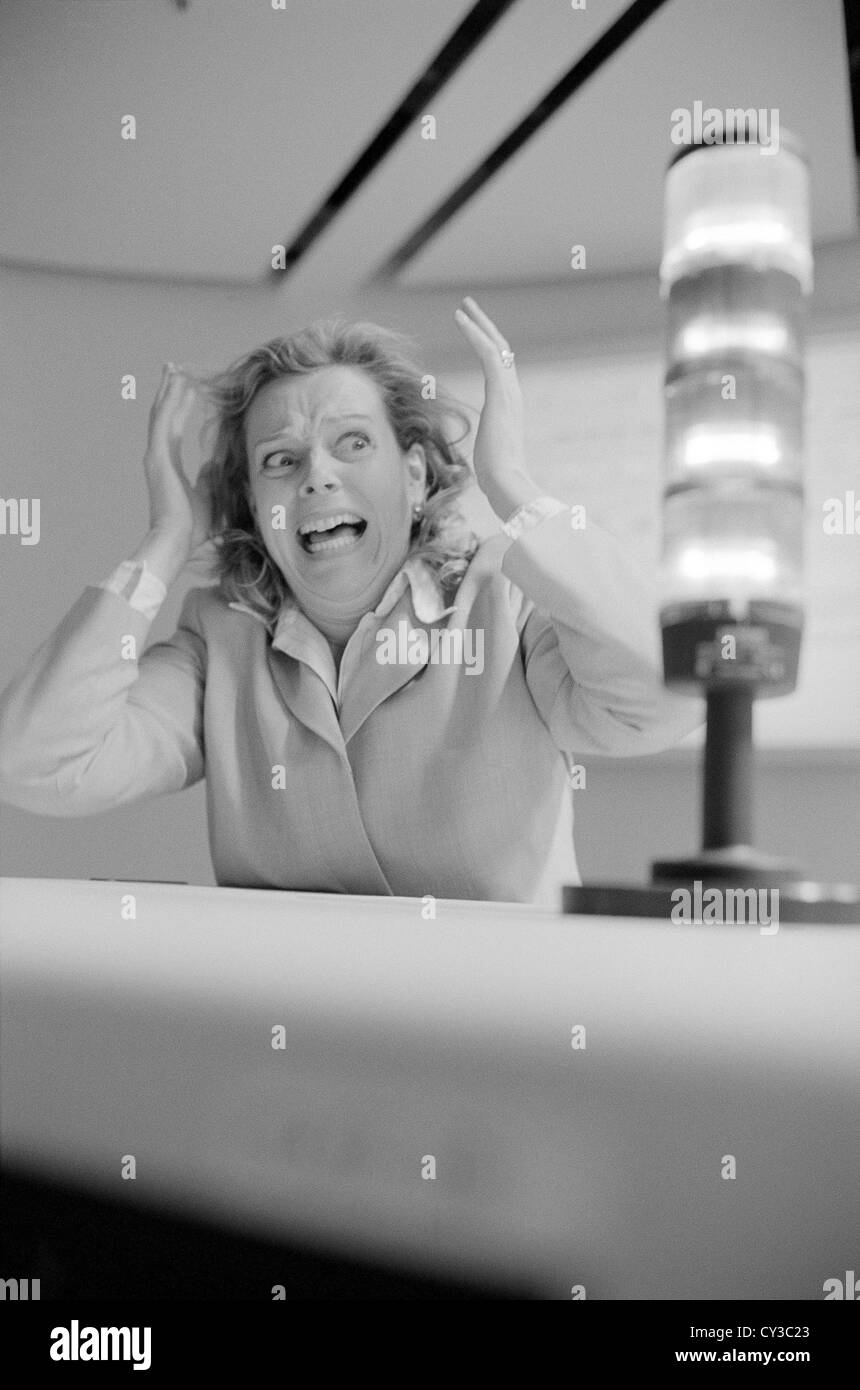 Emotional office worker sitting Black and White Stock Photos & Images ...