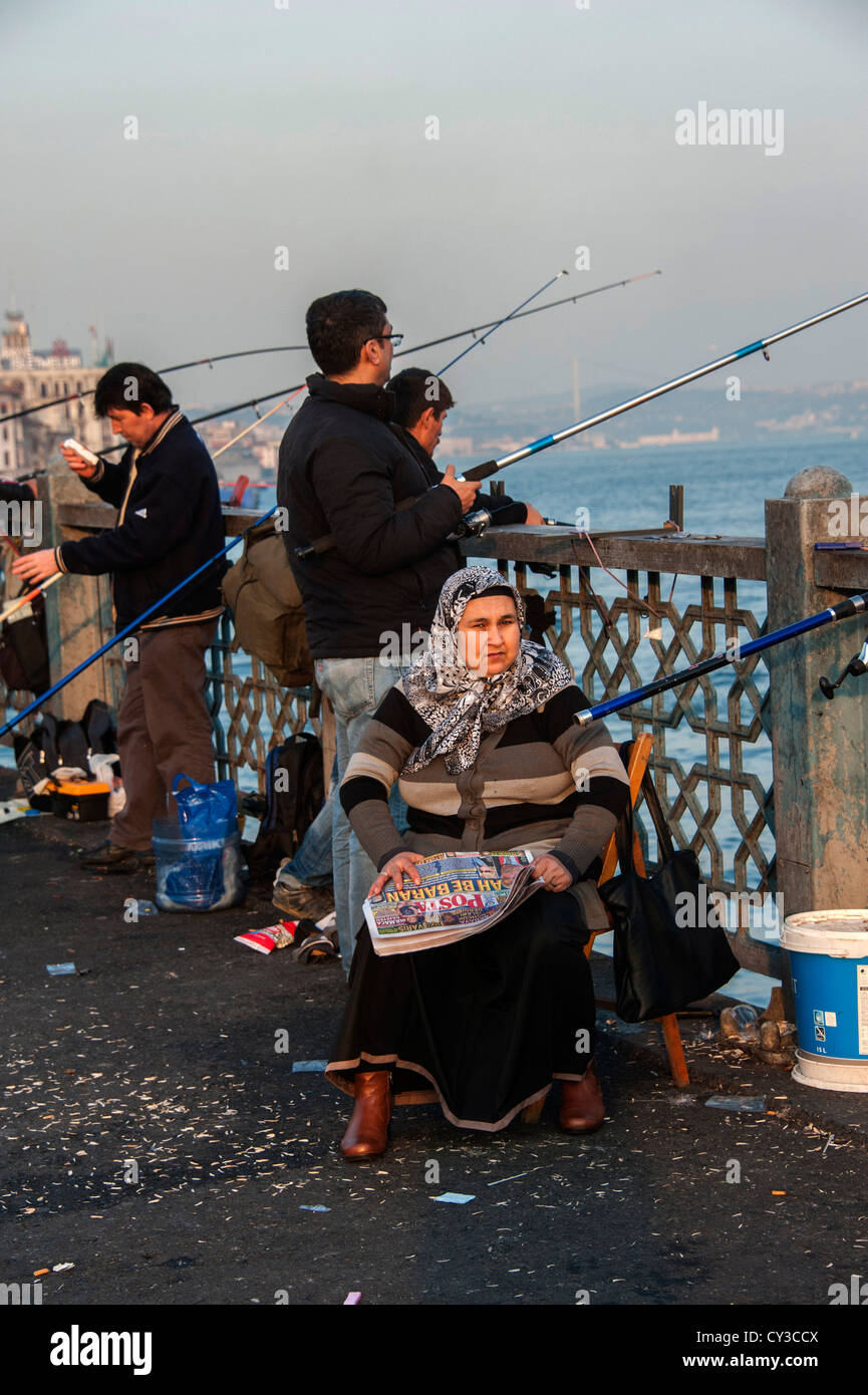 Fishing from the Galata Bridge in Istanbul Turkey Stock Photo - Alamy