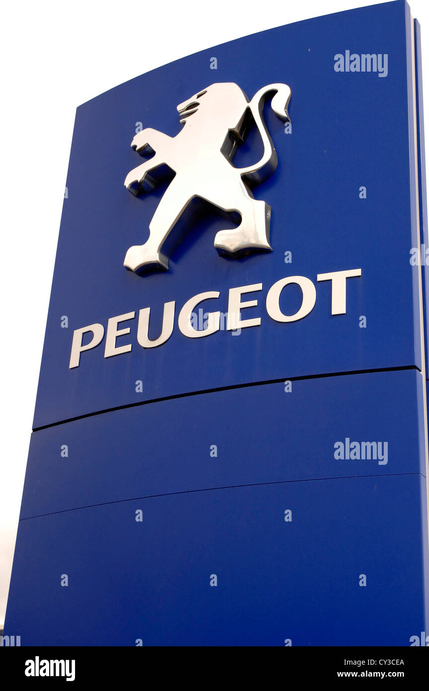Peugeot Car garage dealership sign Stock Photo - Alamy