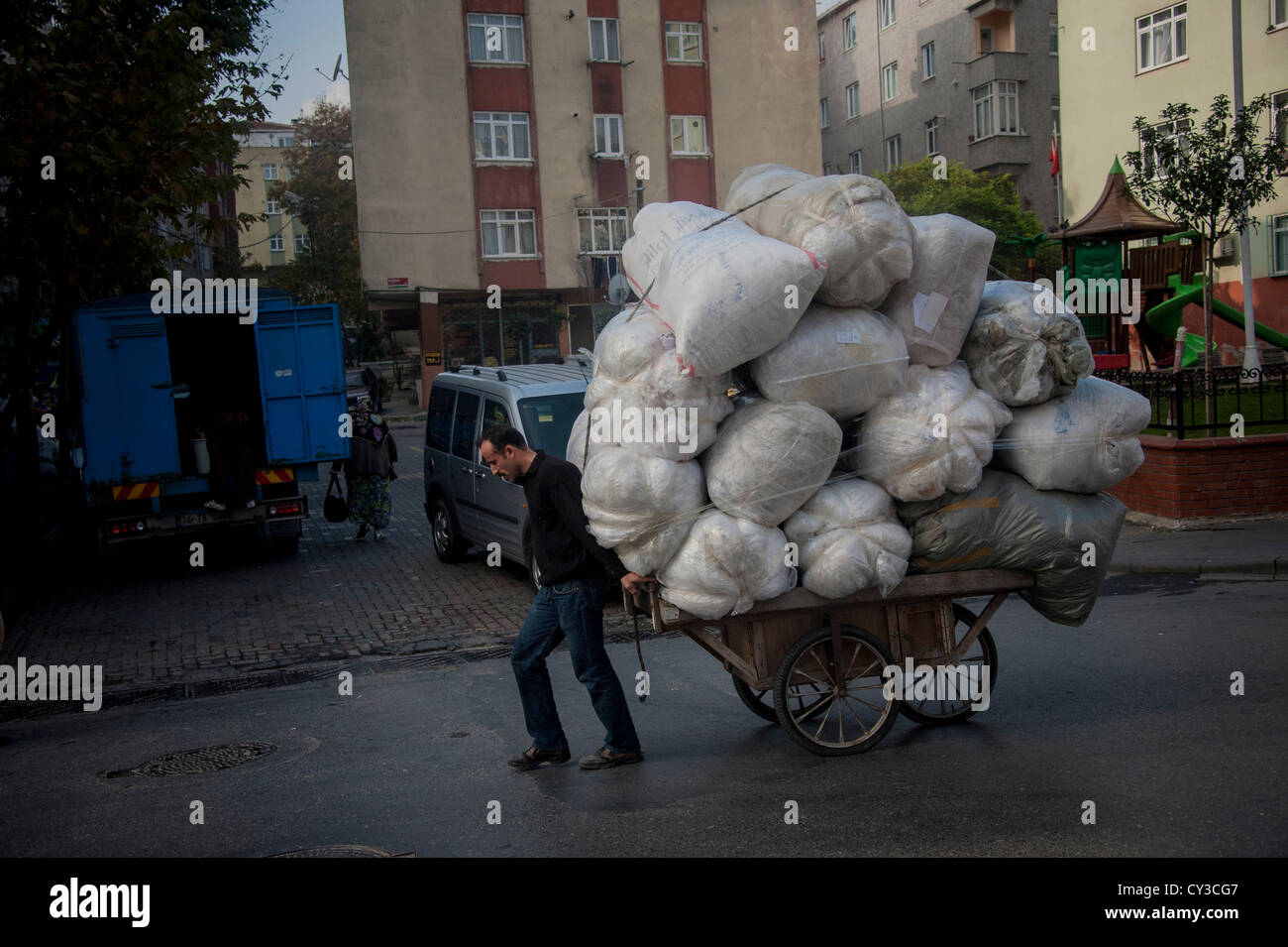 Man with a heavily loaded cart in Istanbul Turkkey Stock Photo - Alamy