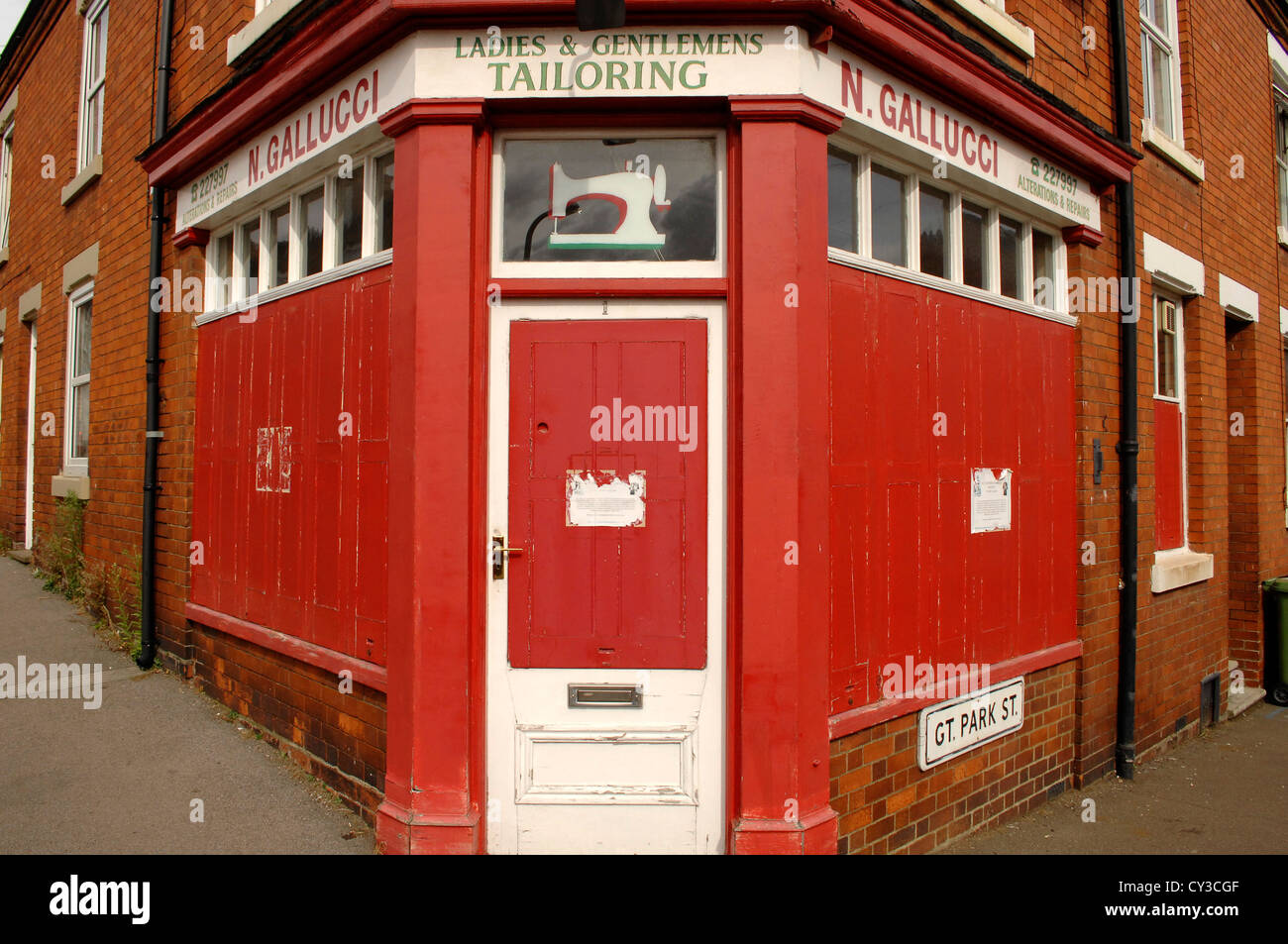 Former Tailor shop building now closed Stock Photo - Alamy