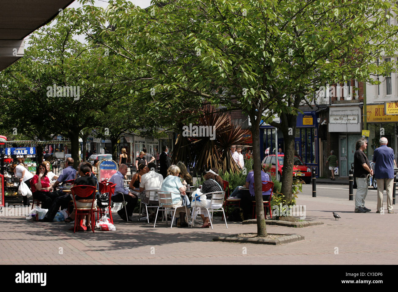 People sitting outside a cafe in High Street, Harborne, a suburb of ...