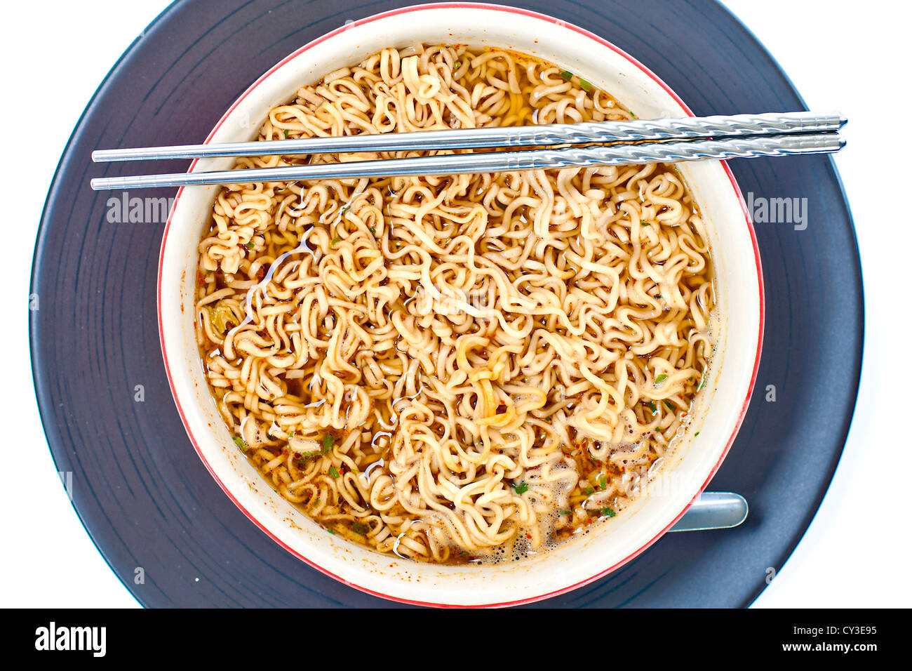 Instant noodle and chopsticks isolated with path on white background ...