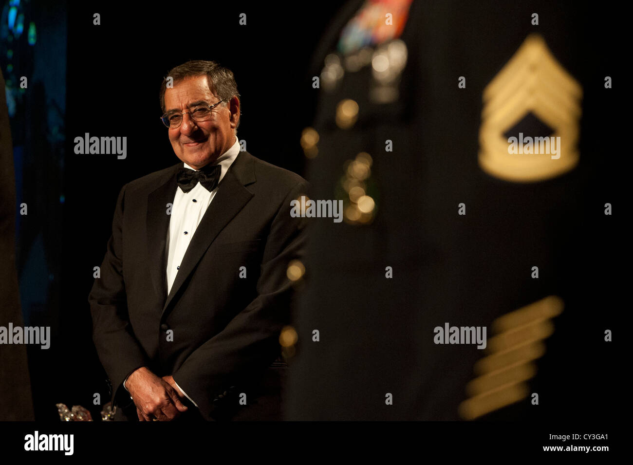 Secretary of Defense Leon Panetta watches as Army attendees are ...