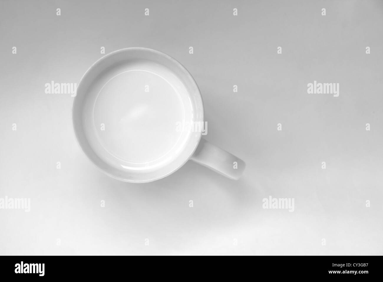 cup of milk on a light background Stock Photo - Alamy