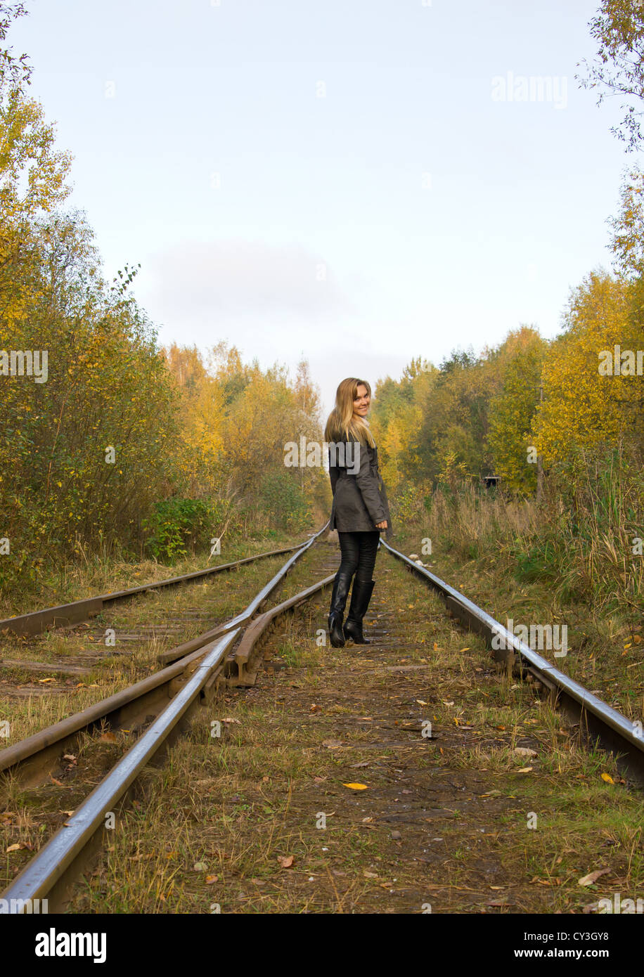 Young pretty woman walks Stock Photo - Alamy