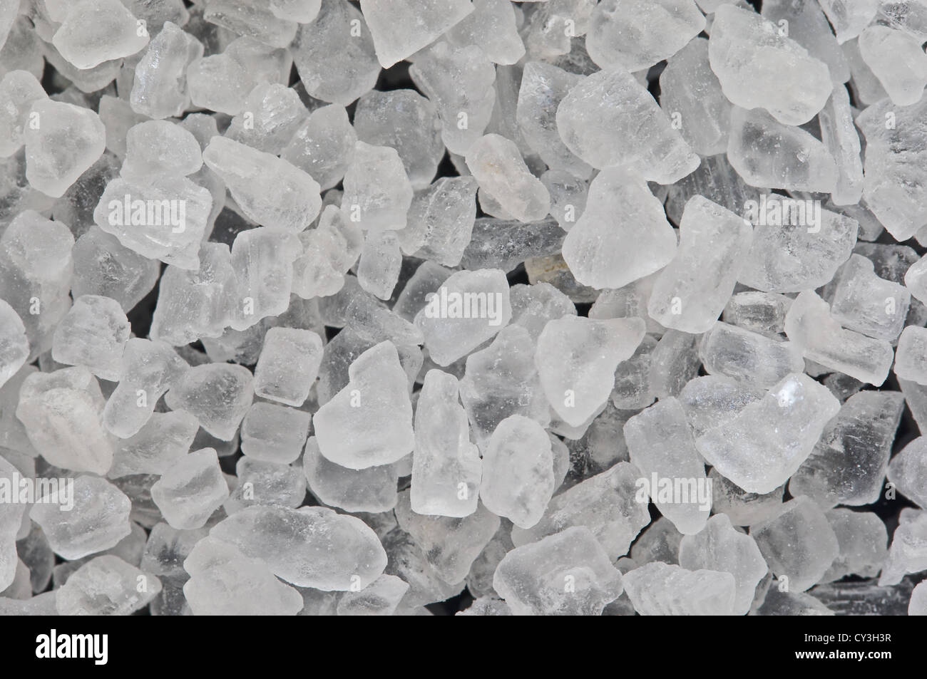 Macro image highlighting the form and shape of course ground rock salt ...