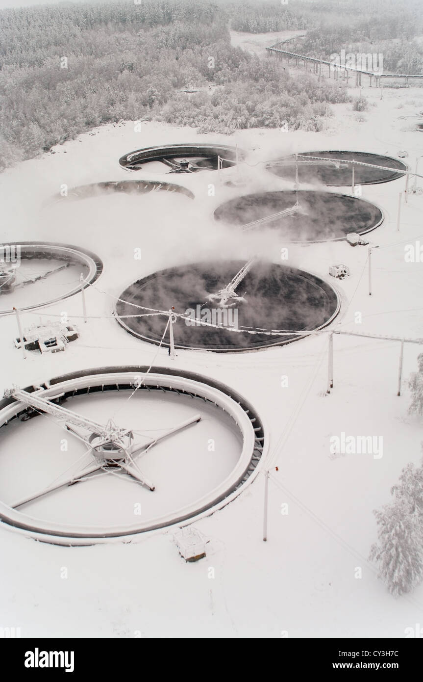 Snow covered sedimentation tanks with sewerage. Aerial view Stock Photo ...