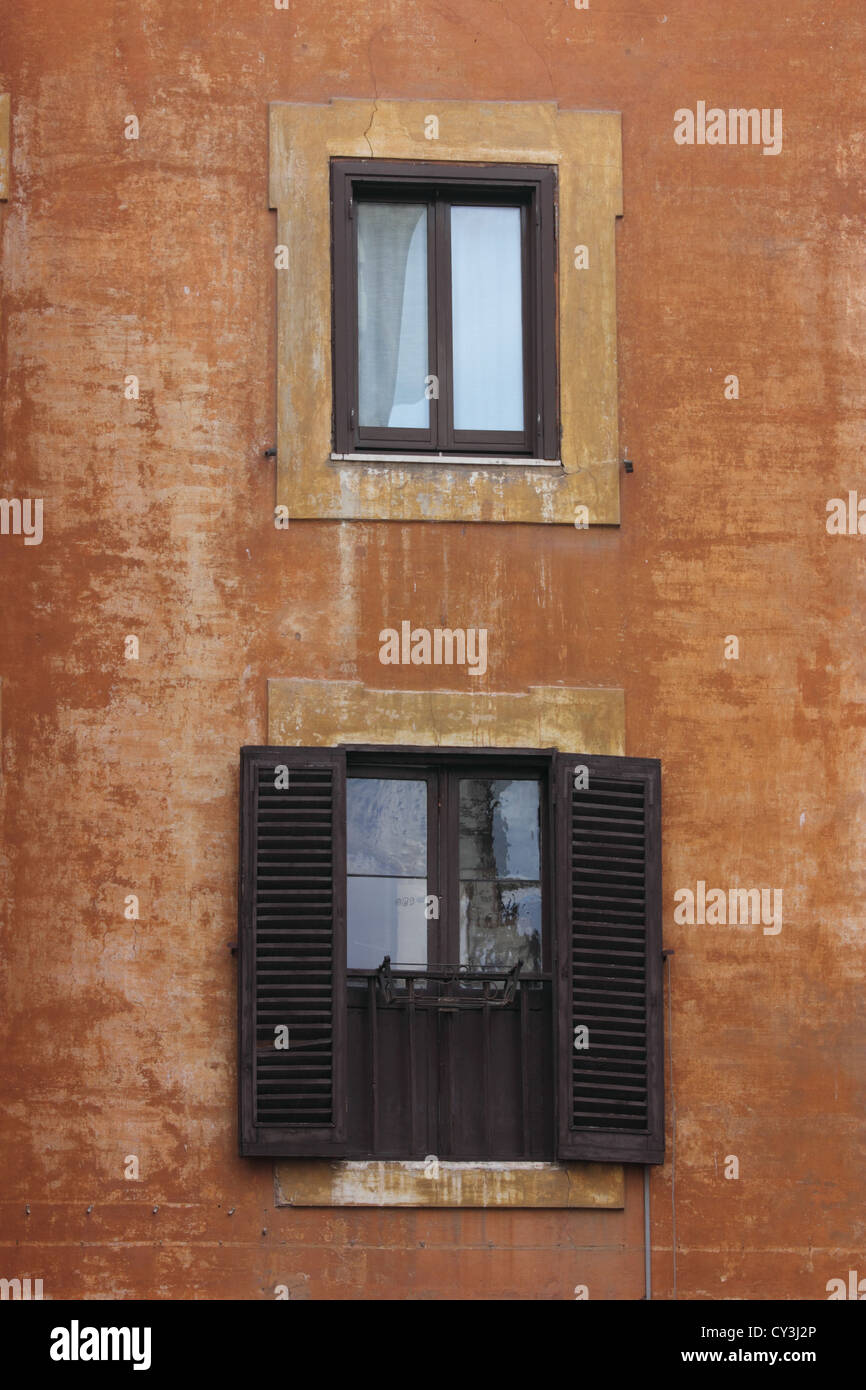 beautiful old building front faces in the center of Rome, Italy, urban ...
