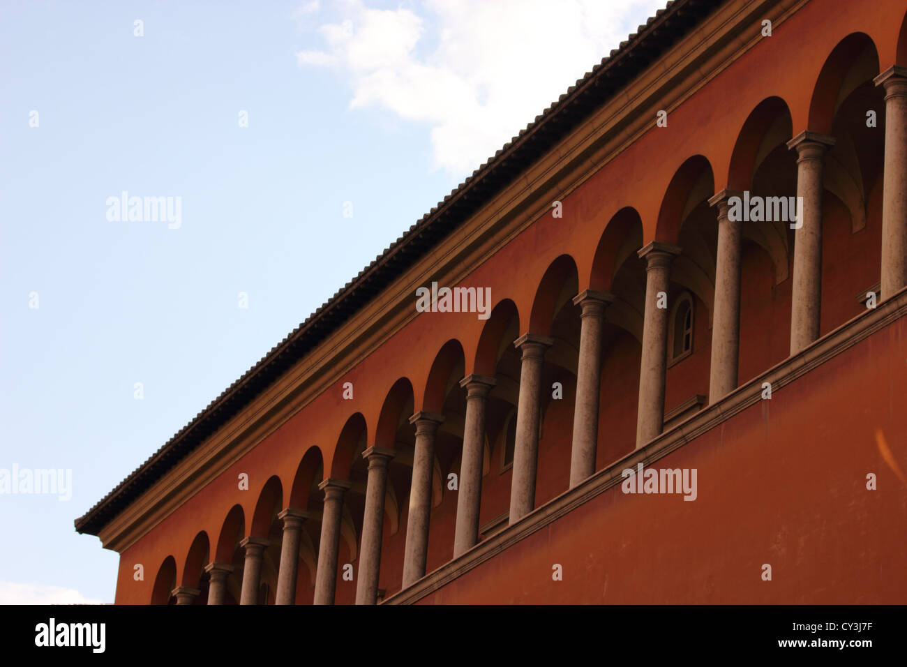 Bright orange building with columns and arches hi-res stock photography ...