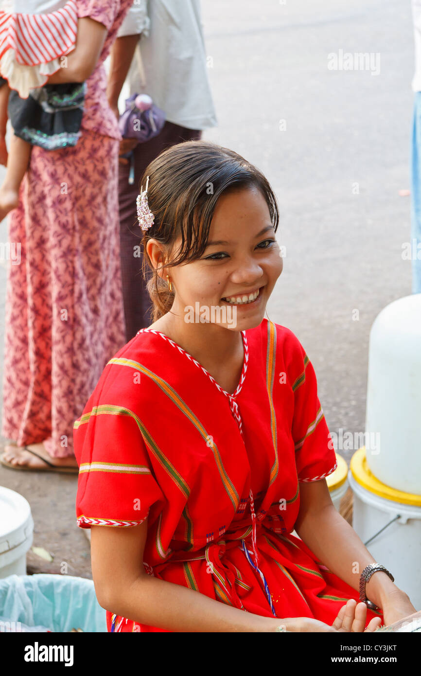 Young Girl with traditional Thanaka Make-Up in her Face in Rangoon ...
