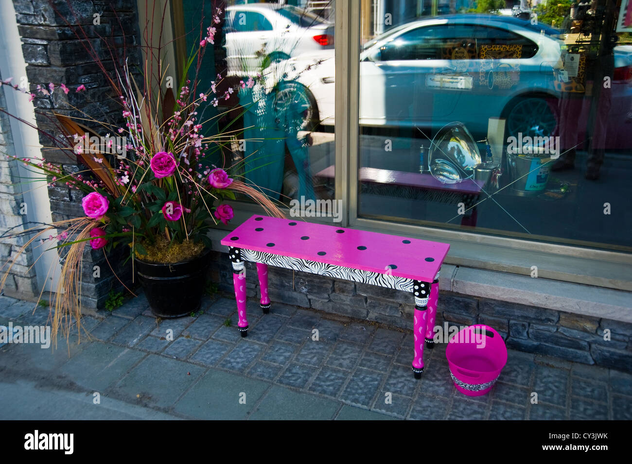 pink bench and flowers Stock Photo - Alamy