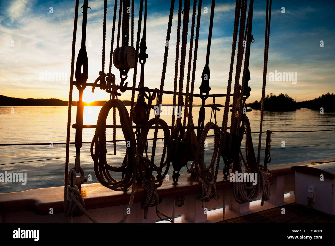 Aboard the historic tall ship Zodiac at sunset looking through the ...