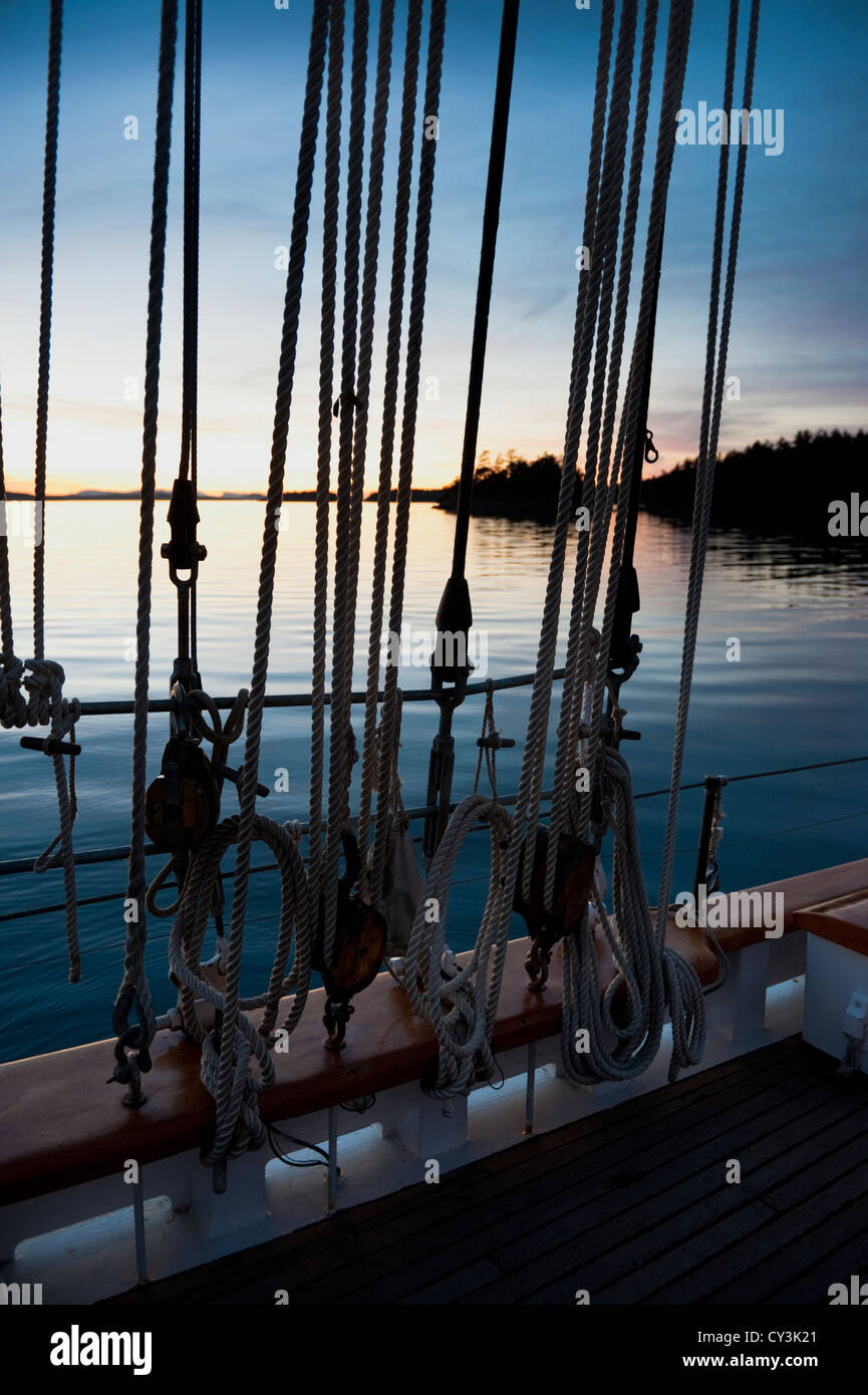 Aboard the historic tall ship Zodiac at sunset looking through the ...