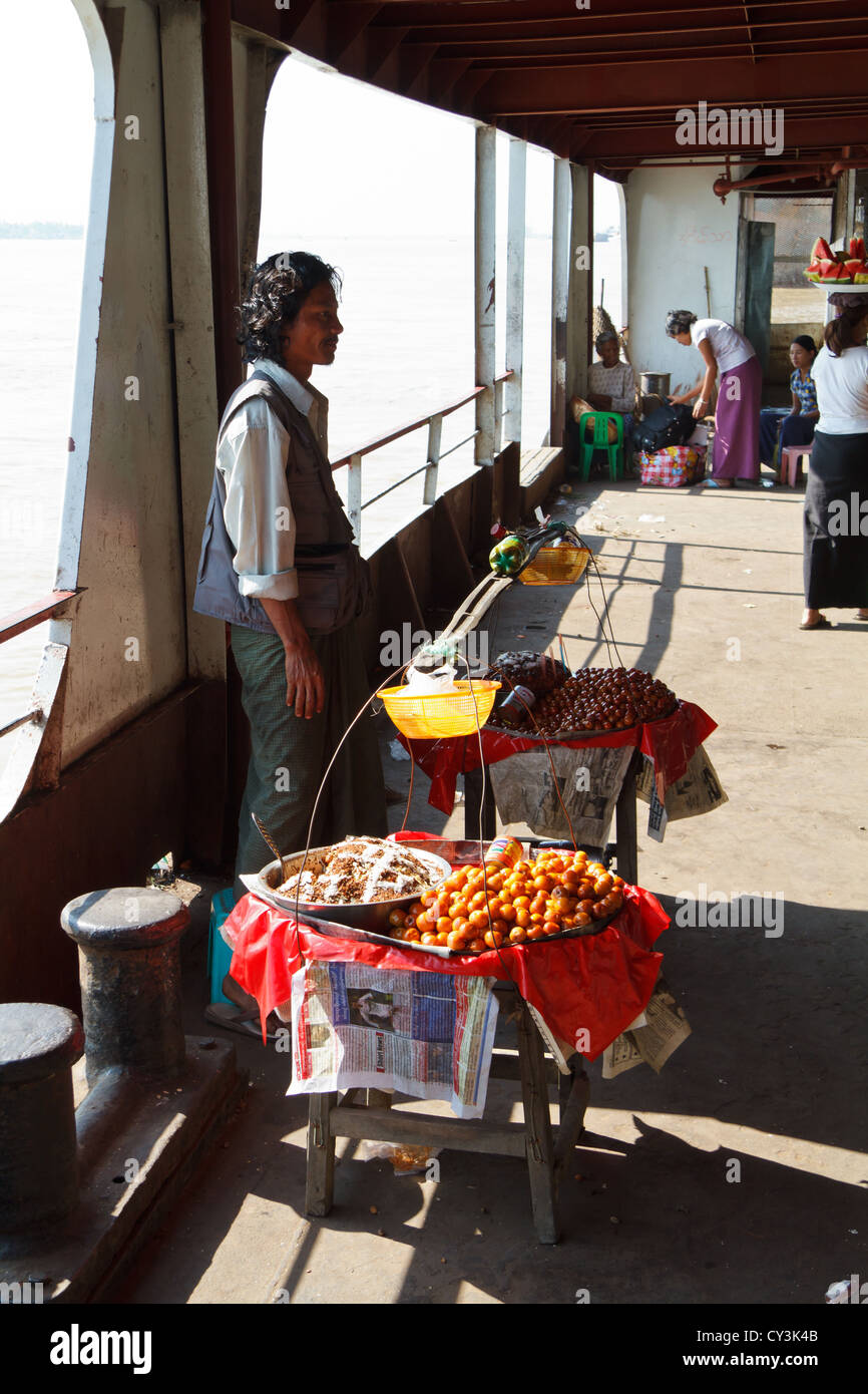 Sale of Snack Food on a Ferry Boat in Rangoon, Myanmar Stock Photo - Alamy