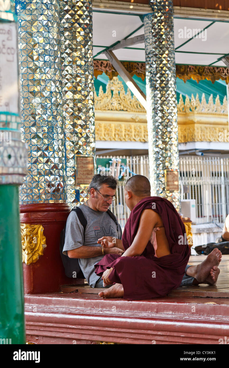 Buddhist monk temple talking hi-res stock photography and images - Alamy