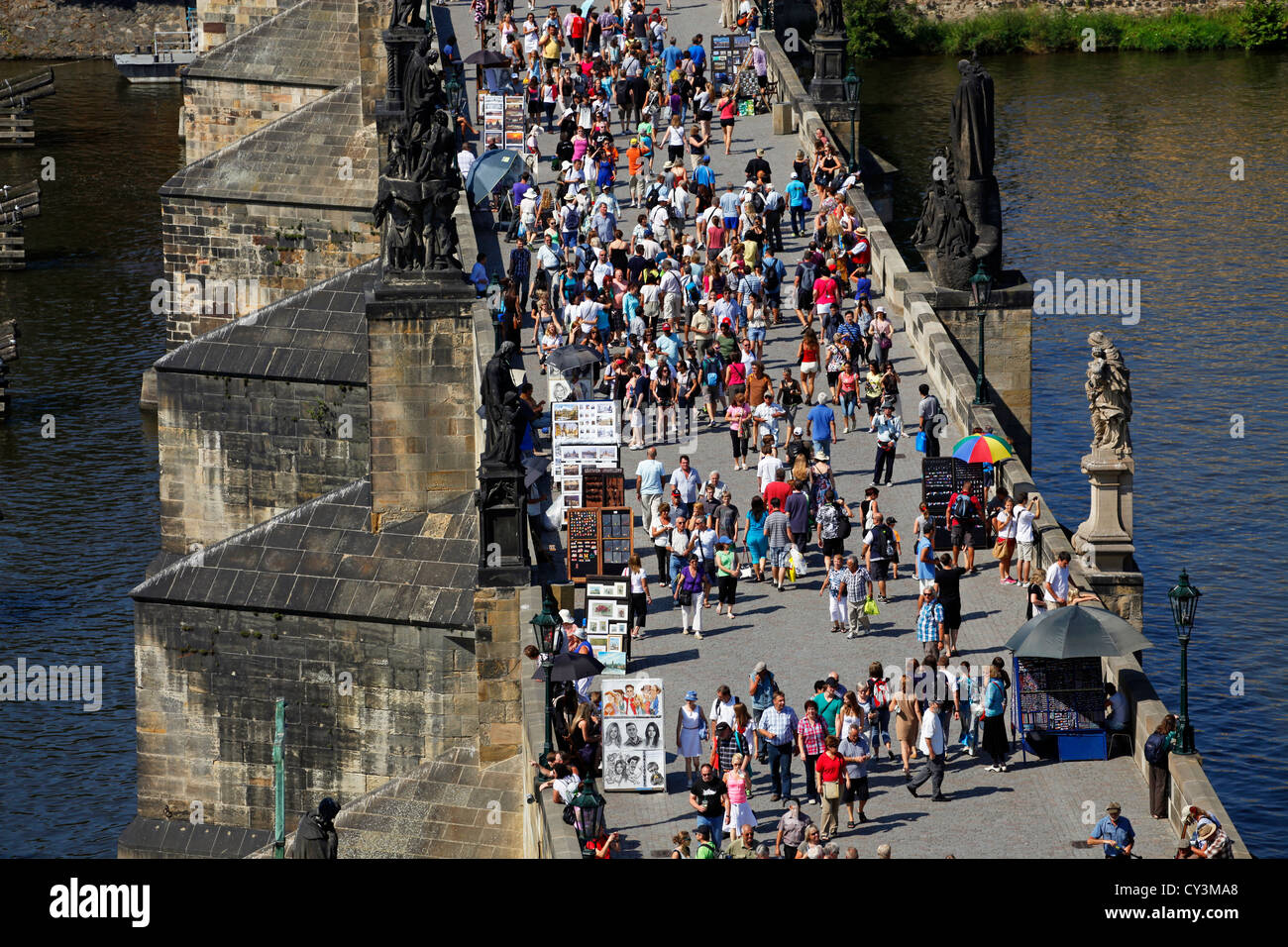 Crowds of tourists on the Charles Bridge in Prague, Czech Republic ...